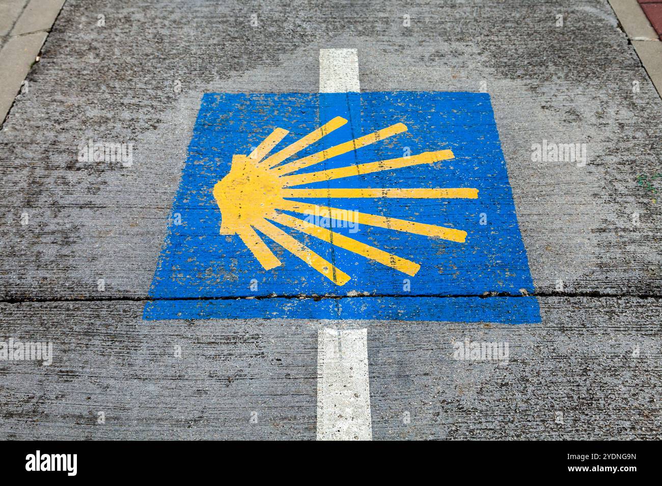 Symbol of pilgrimage route Camino de Santiago on a public pathway ...