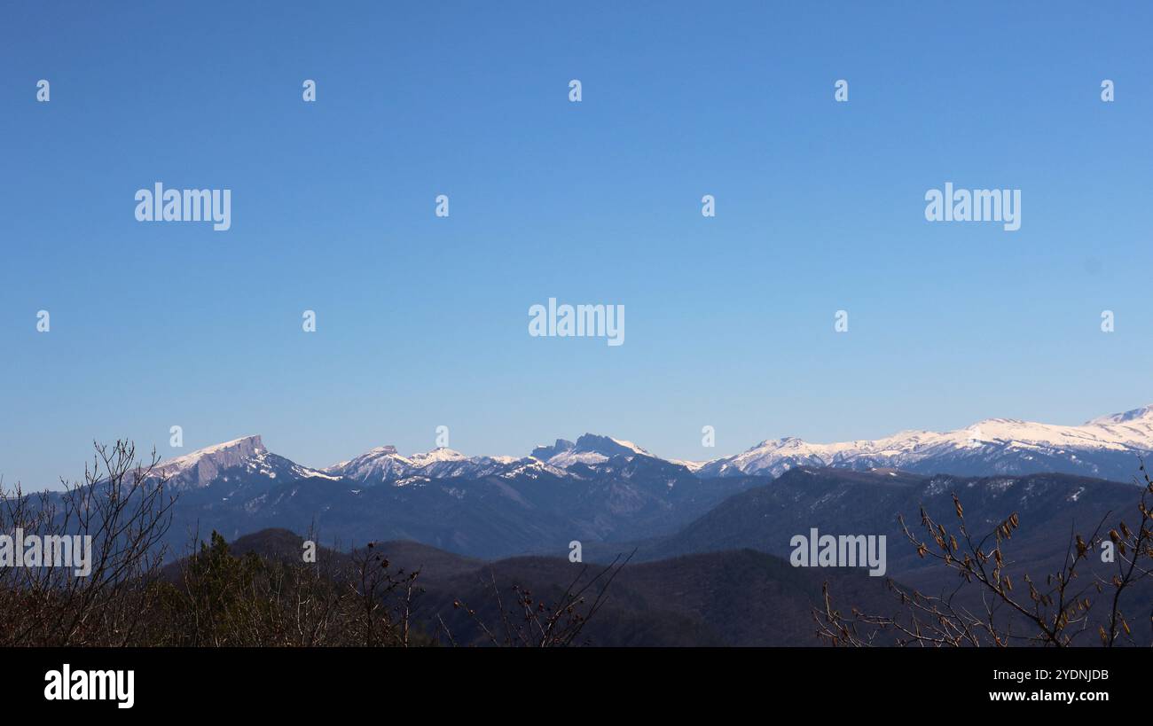 Snow-capped peaks and forested mountains of the Republic of Adygea ...