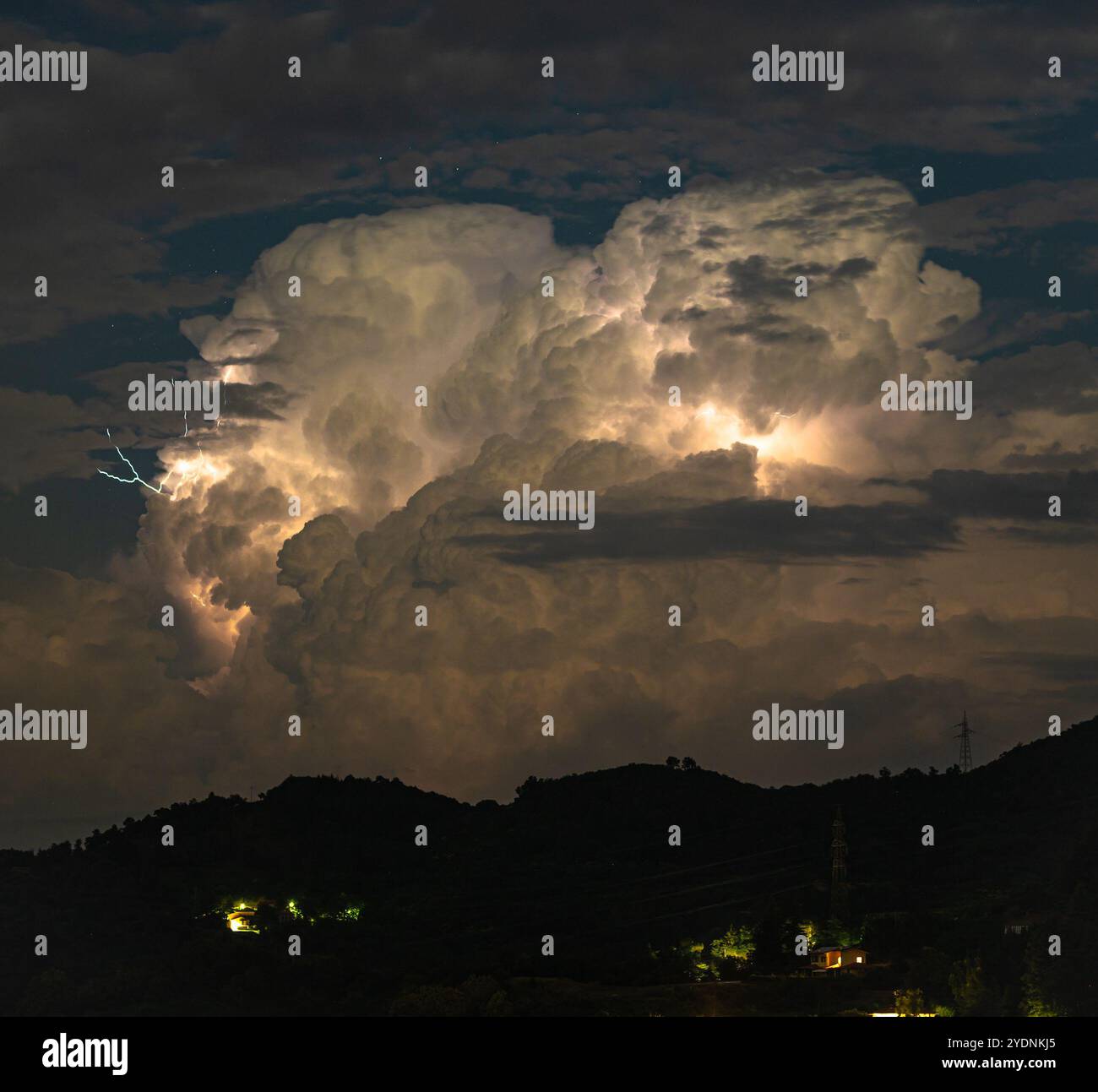 Thundercloud over Po river valley, Italy is illuminated by lightning at ...