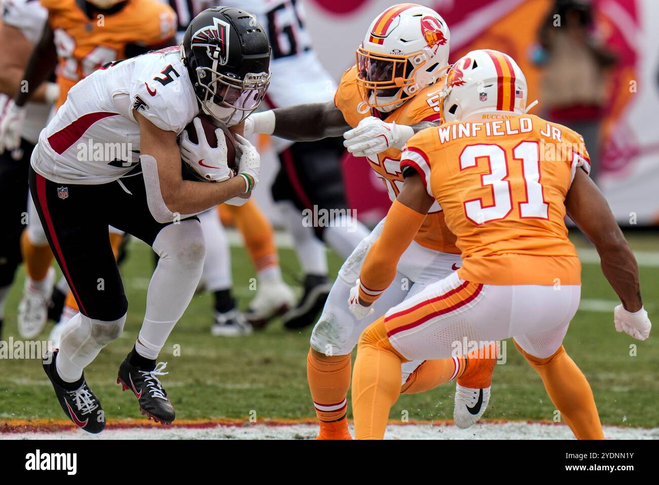 Atlanta Falcons wide receiver Drake London (5) is stopped by Tampa Bay ...