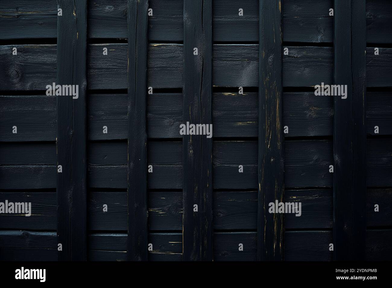 Textured black wooden planks display a rich array of grain patterns and ...