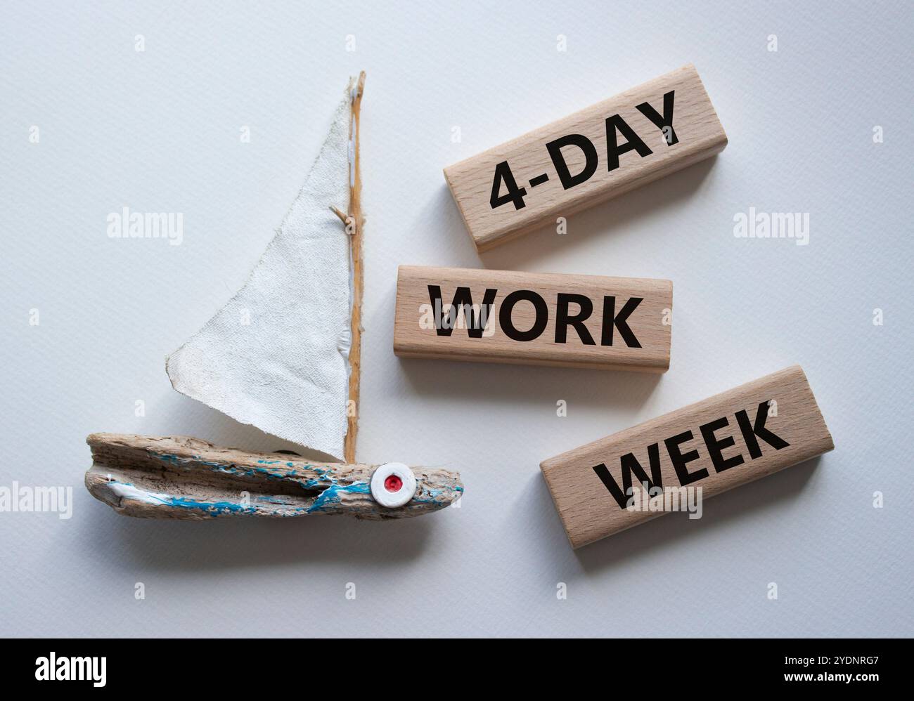 4-day work week symbol. Concept words 4-day work week on wooden blocks ...