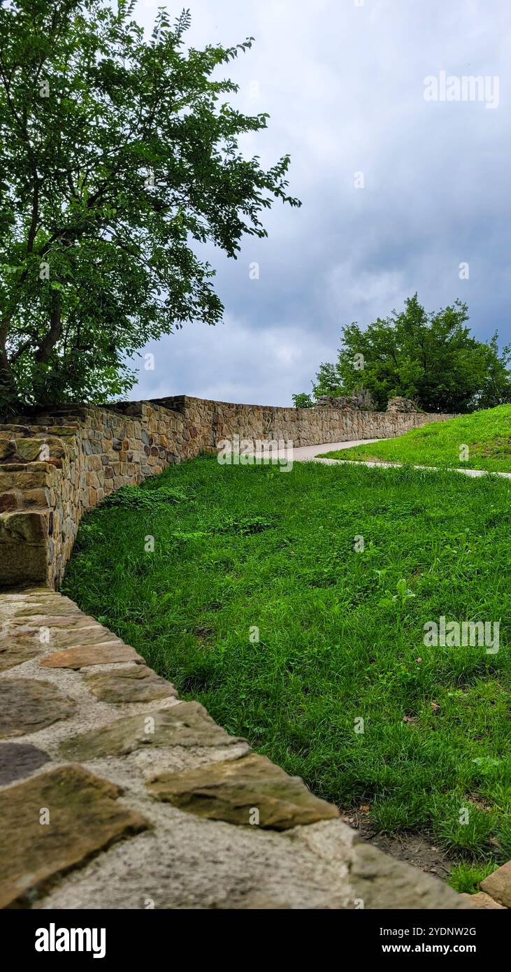 Stone paths in a green park Stock Photo - Alamy