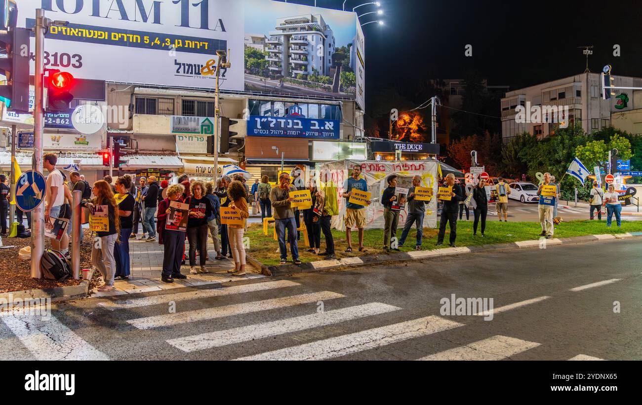 Haifa, Israel - October 26, 2024: Scene of people with sign and flags ...