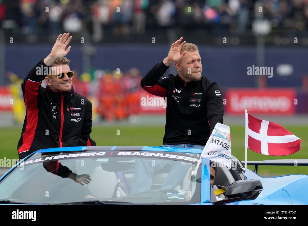 Haas driver Nico Hulkenberg of Germany, left, and teammate Kevin ...