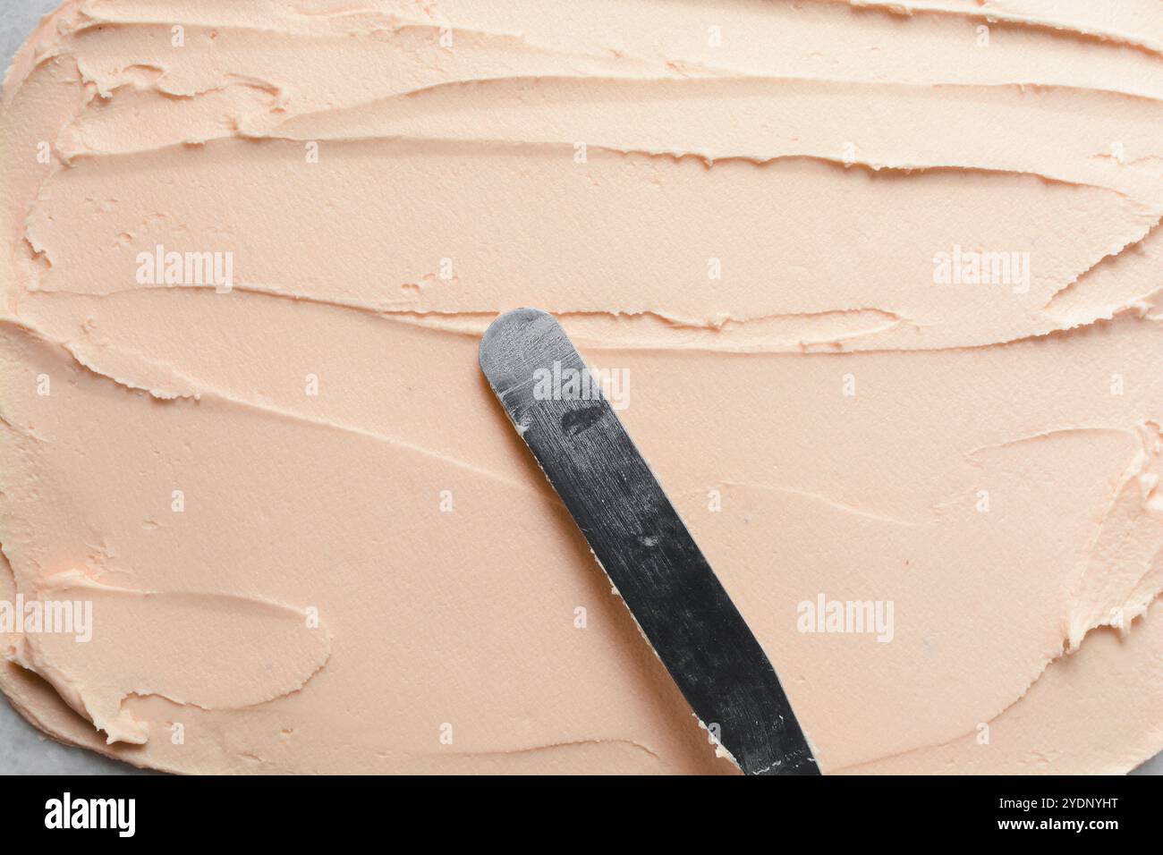 Top view of orange buttercream for decorating cake, silky smooth peach ...