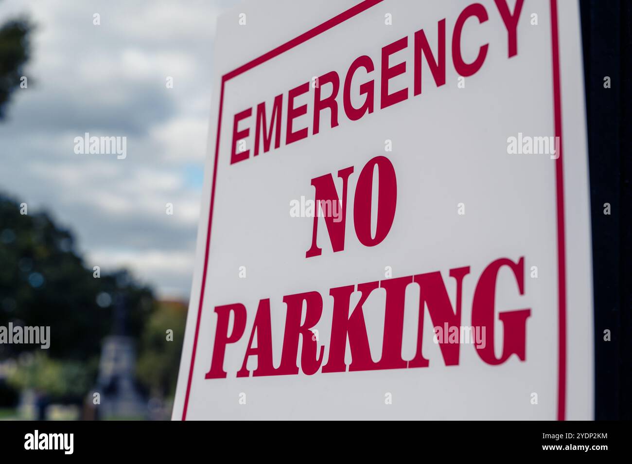 Emergency no parking sign red letters on white background with copy ...