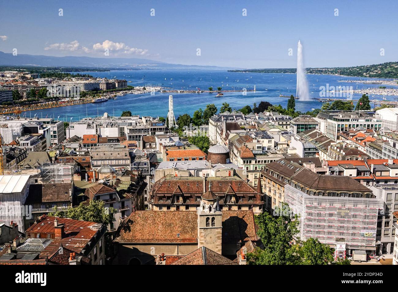 View of the Jet d’Eau or La Rade fountain and city center along Lake ...