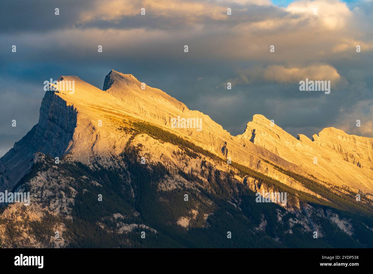 Sunset light on summit of mountains in Banff National Park, Alberta ...