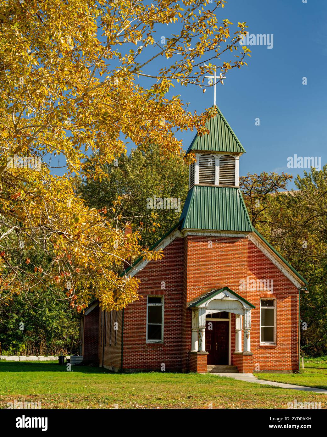 Fall trees and red brick church in Lapwai Idaho Stock Photo - Alamy