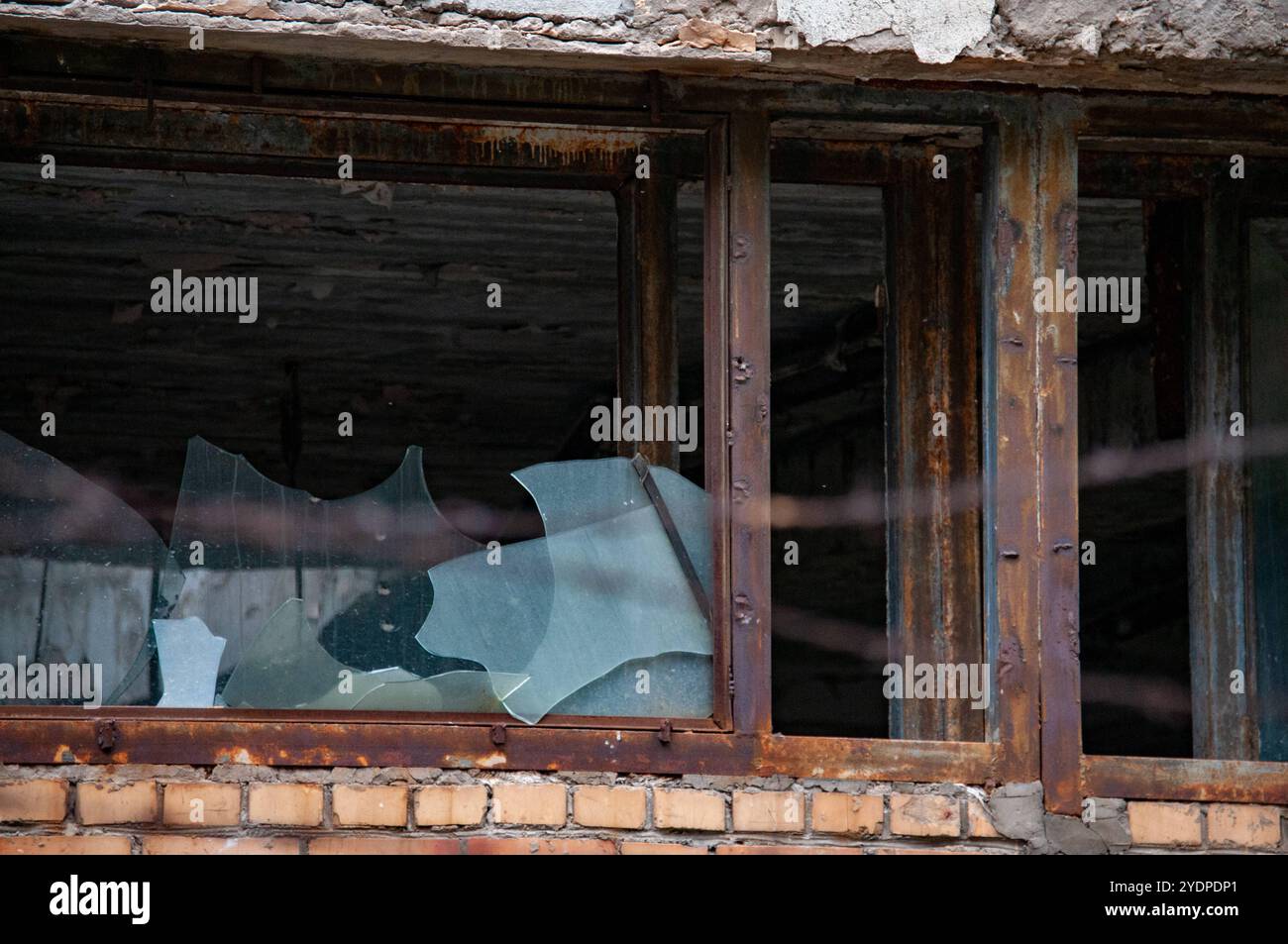 Dilapidated housing in Samara Broken glass from the windows of an ...