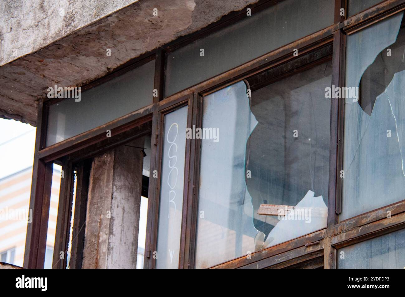 Dilapidated housing in Samara Broken glass from the windows of an ...