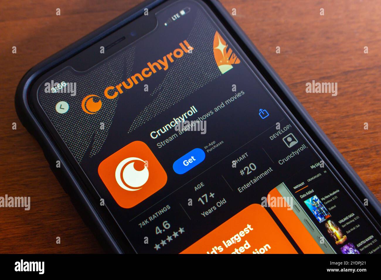 Crunchyroll app is displayed in the App Store on an iPhone screen ...