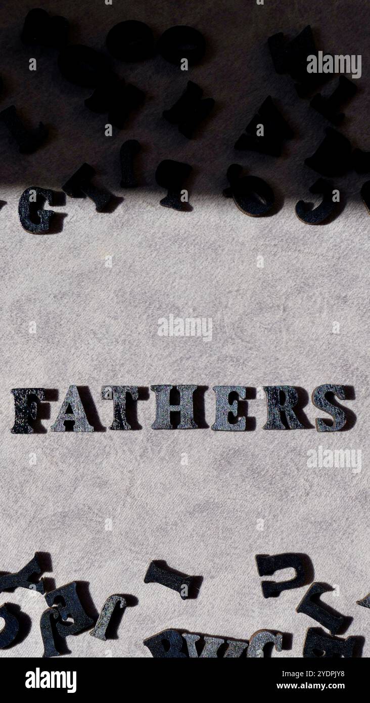 Lettering father in black letters on grey background on father's day ...