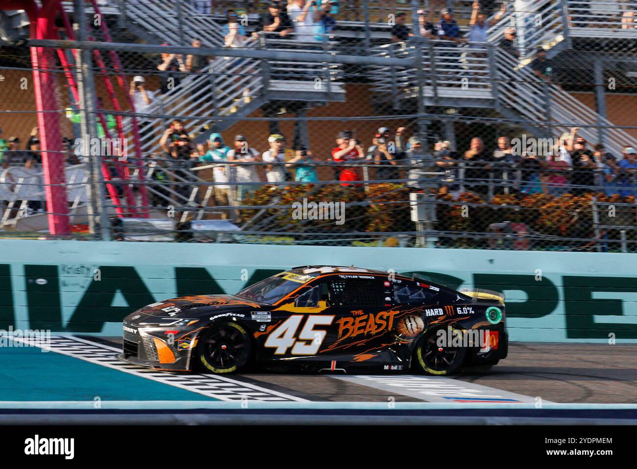 Tyler Reddick crosses the finish line to win a NASCAR Cup Series auto ...