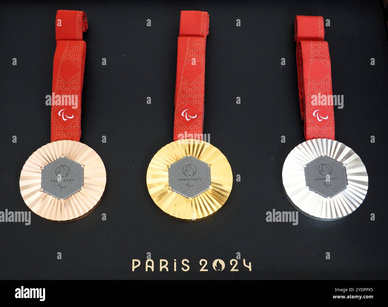 Paris 2024 Paralympic gold, silver and bronze medals on a tray before a ...