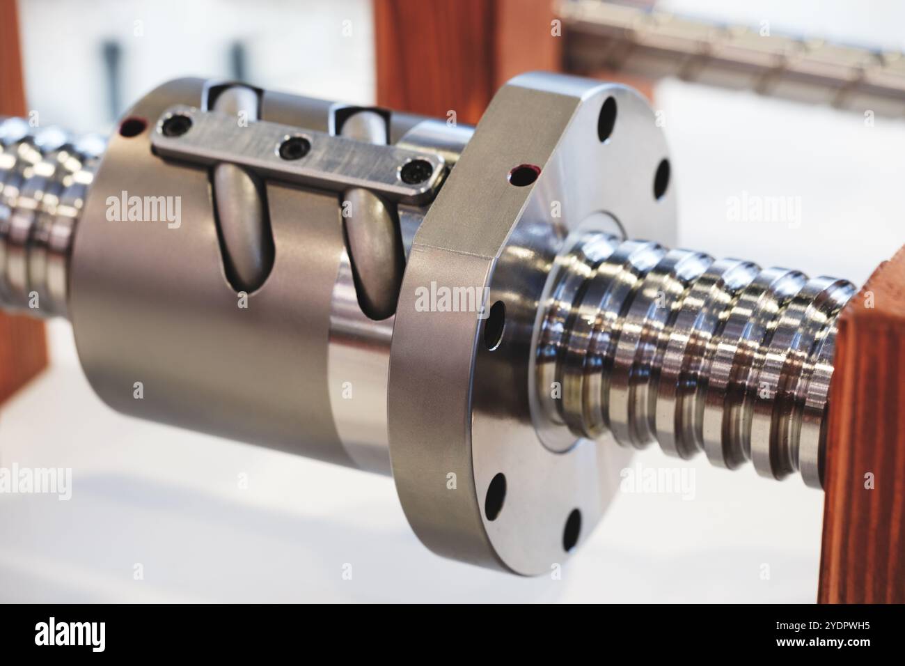 Close up of industrial metal screw shaft as part of screw transmission ...