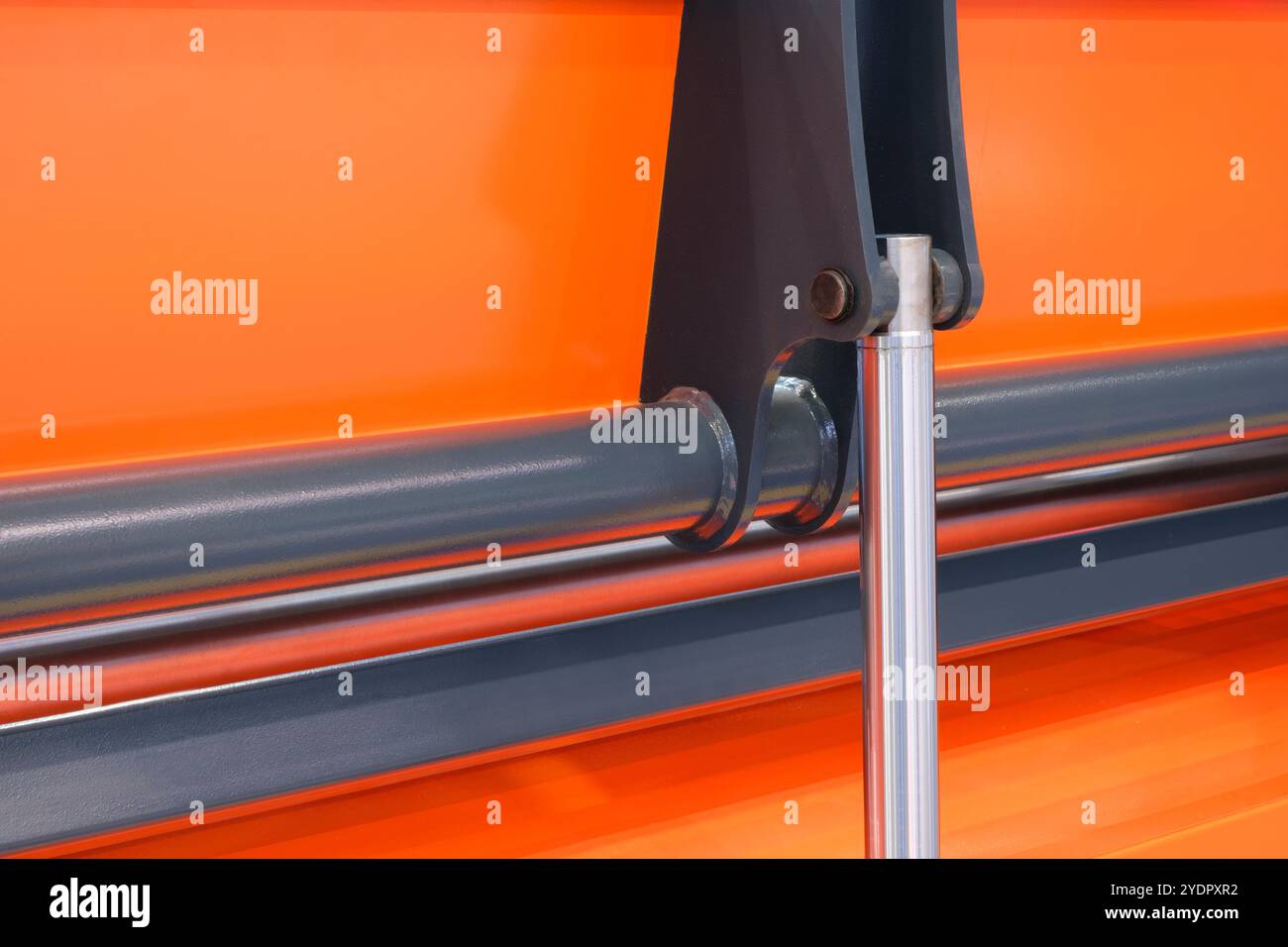 A metal pipe is connected to a metal rod, which is connected to a metal ...