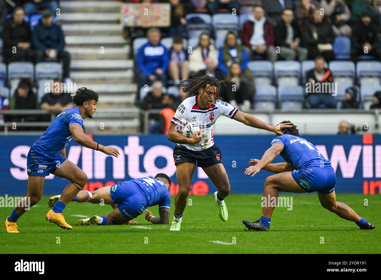 Dom Young of England fends off Shawn Blore Anae Ulisese of Samoa during ...