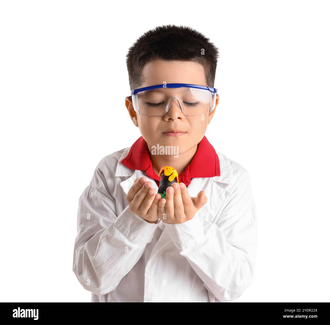 Cute little boy with chemical volcano on white background Stock Photo ...