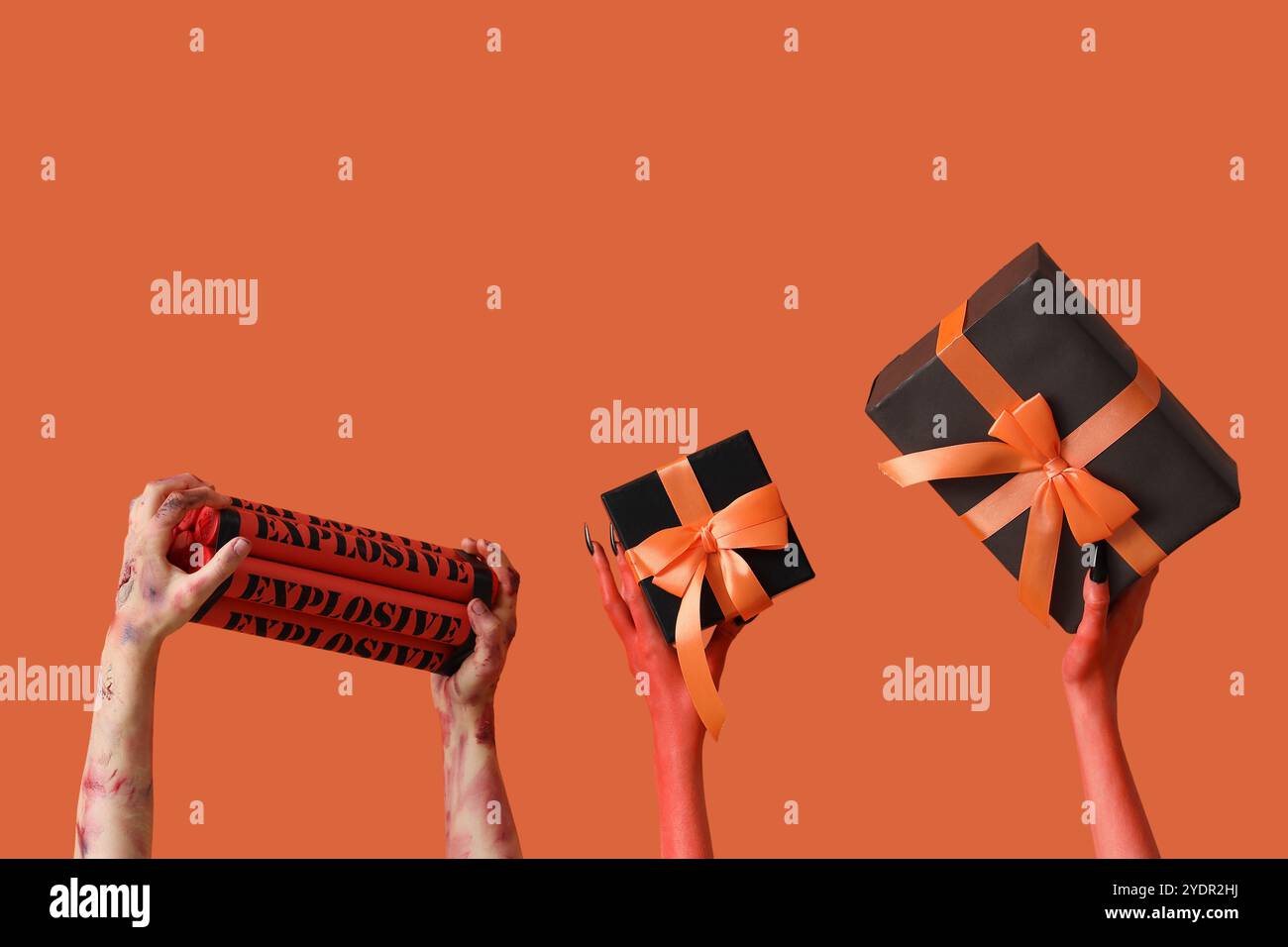 Zombie and devil hands with gift boxes and explosives on orange ...