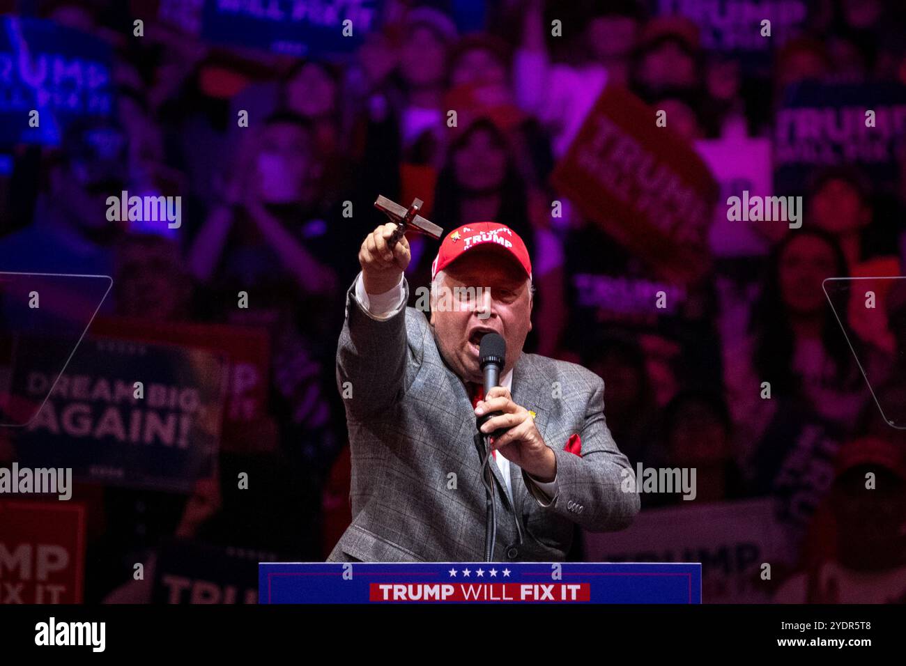 David Rem, a childhood friend of former President Trump, waves his ...