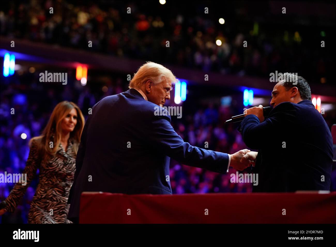 Republican presidential nominee former President Donald Trump shakes ...