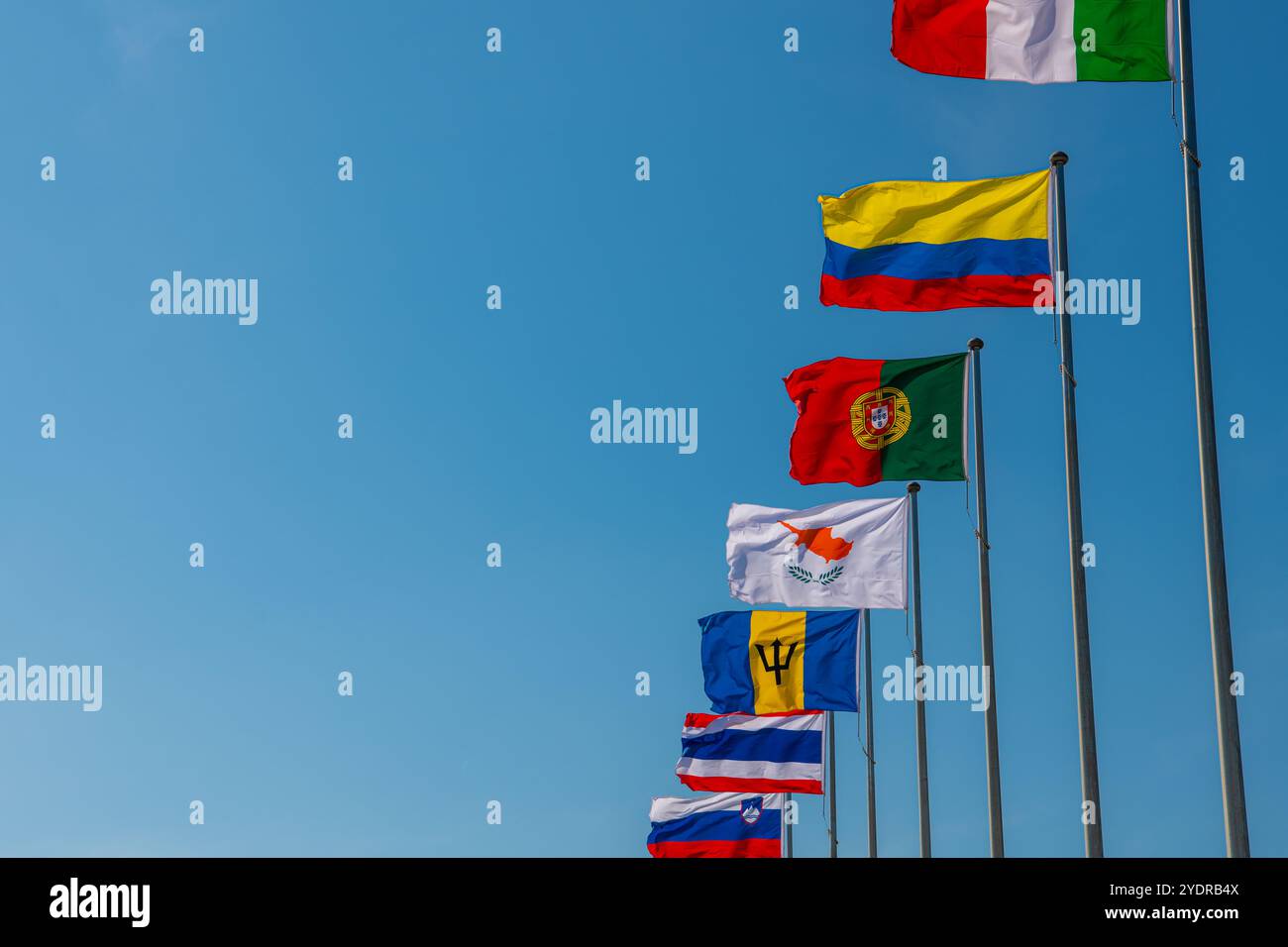 Close up on the countries flags around the marina in Qingdao, China ...