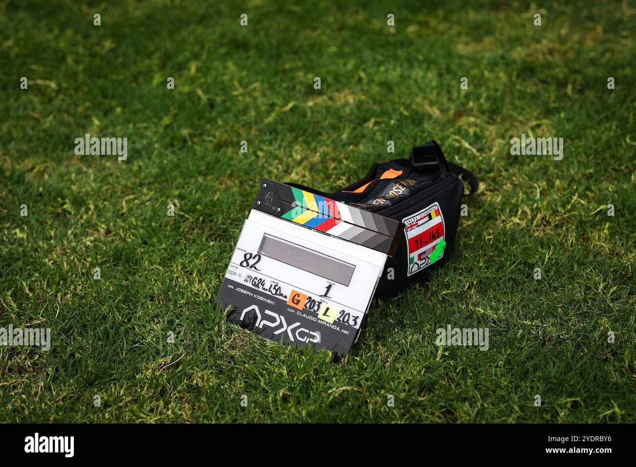 APX GP Team crew filming in the paddock for the Apex F1 movie by Apple ...