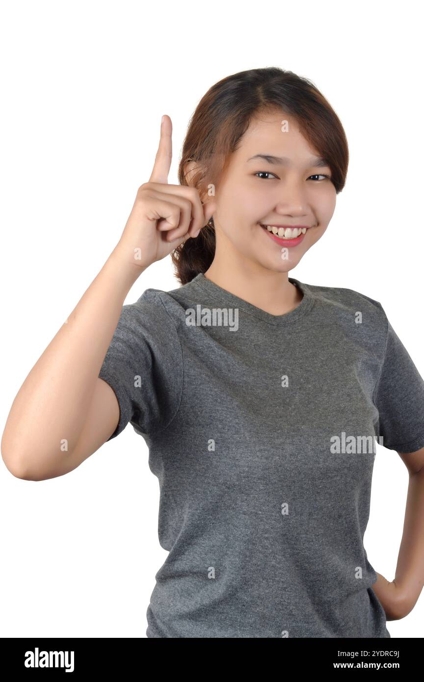 Asian girl points her index finger isolate on white background Stock ...