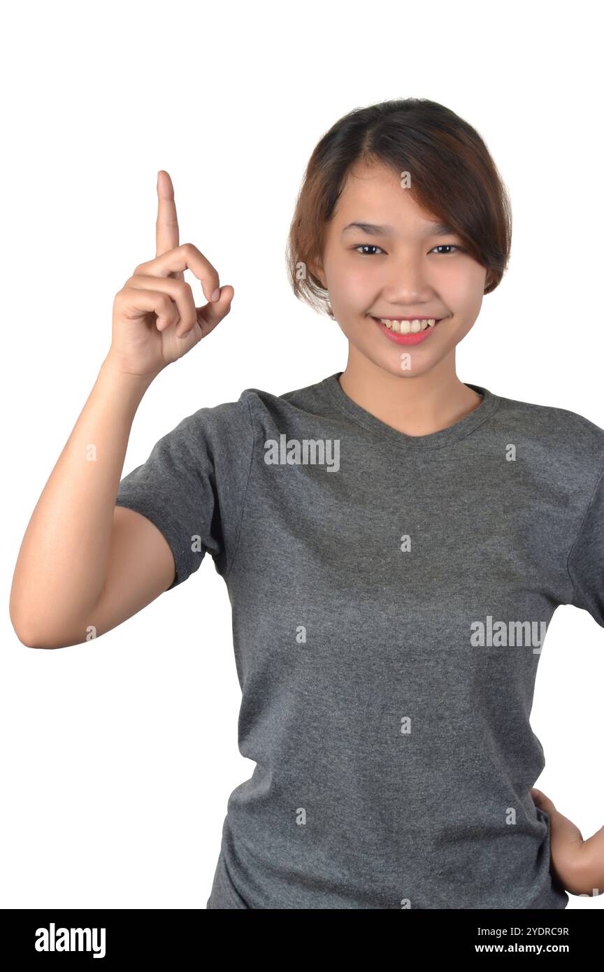 Asian girl points her index finger isolate on white background Stock ...