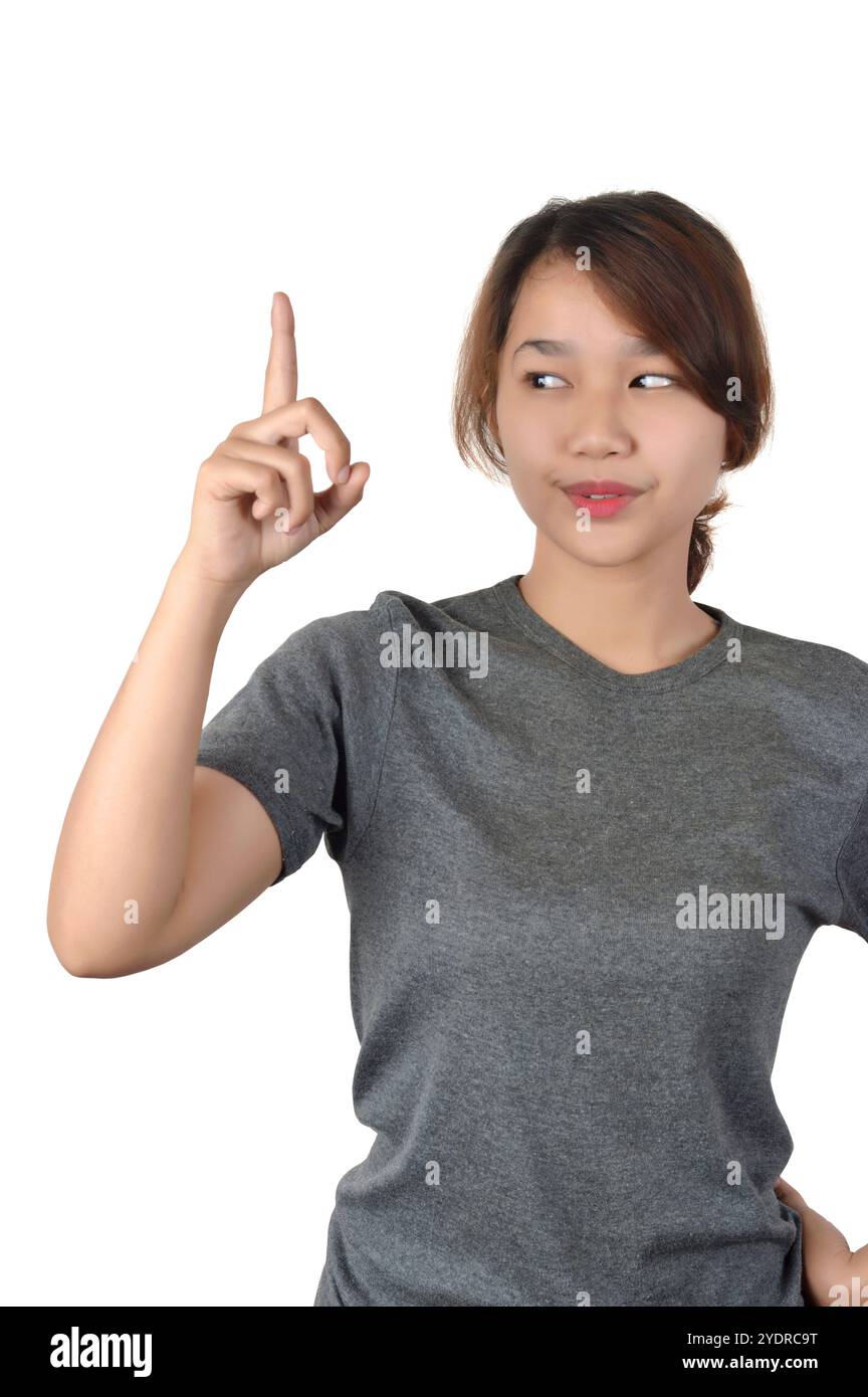 Asian girl points her index finger isolate on white background Stock ...