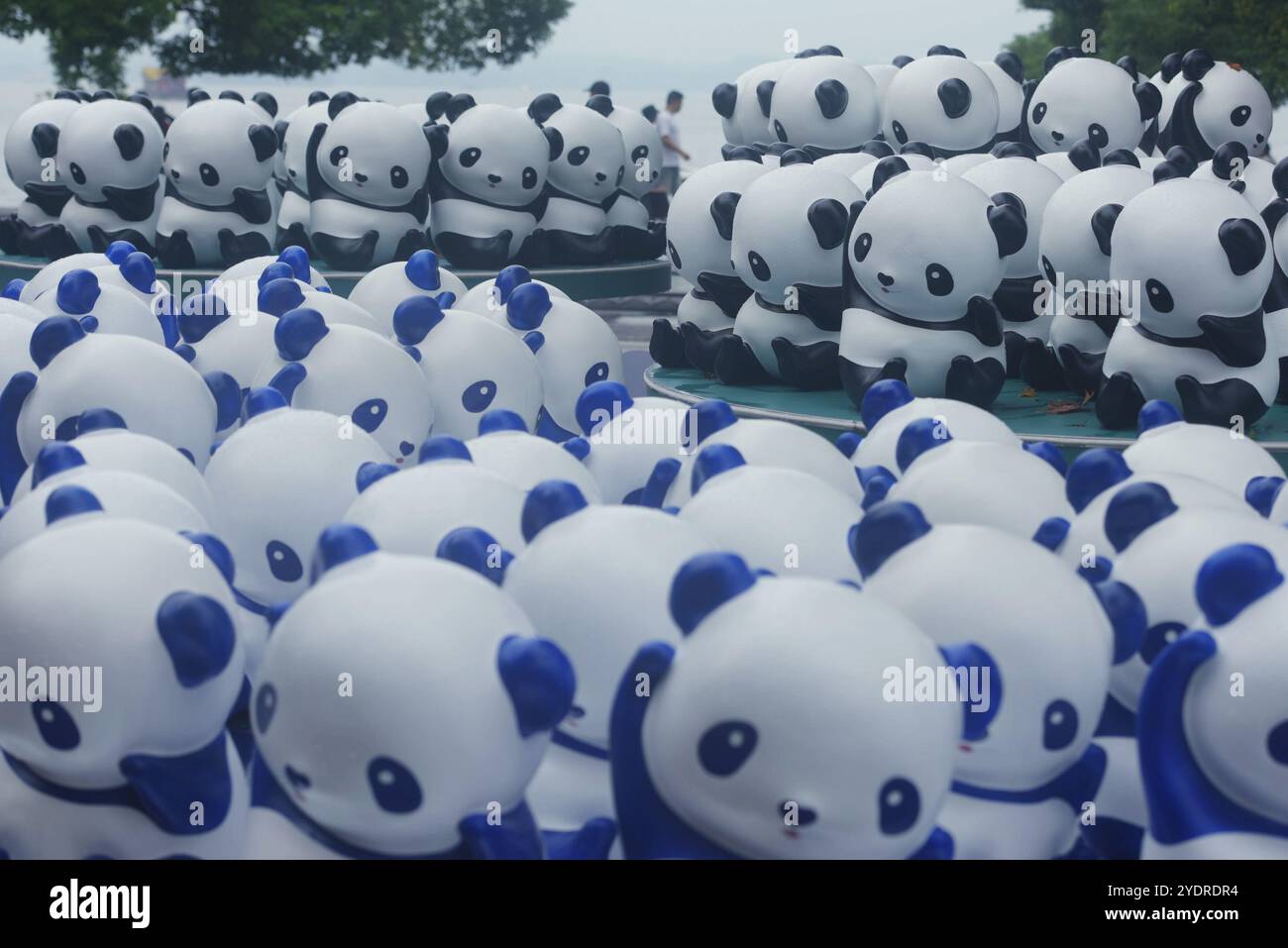 HANGZHOU, CHINA - OCTOBER 28, 2024 - Visitors look at an art ...
