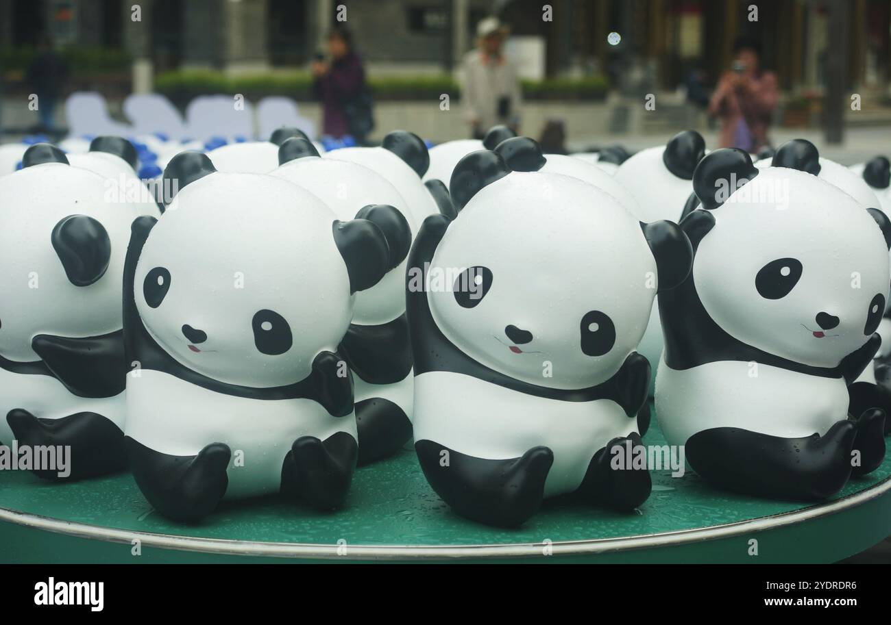 HANGZHOU, CHINA - OCTOBER 28, 2024 - Visitors look at an art ...