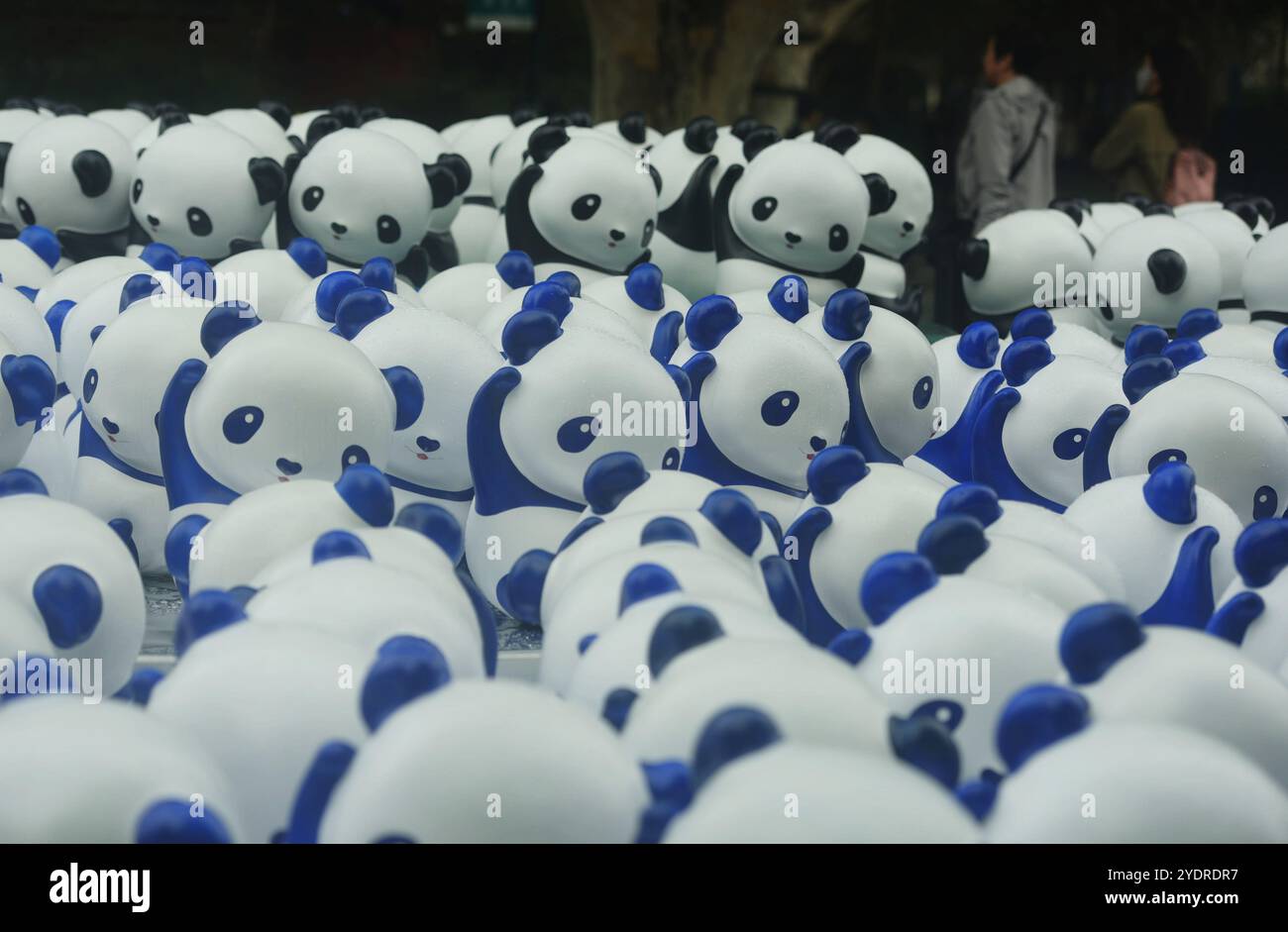 HANGZHOU, CHINA - OCTOBER 28, 2024 - Visitors look at an art ...