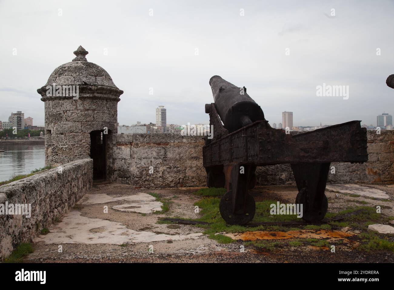 Cannons and downtown on the othe rside of the bay, Castillo del Morro ...