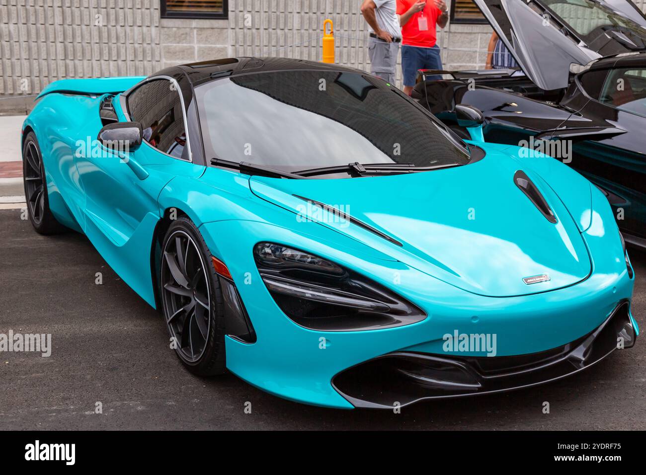 This blue McLaren 720S sports car is on display as part of the 2022 ...