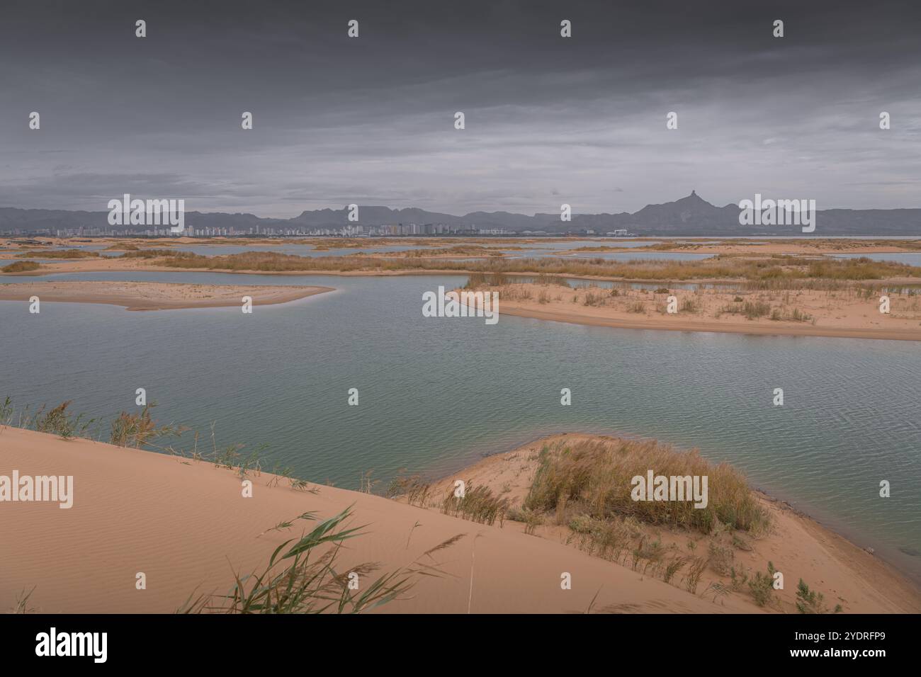 Tengger desert scenery with the lake in Wuhai, Inner Mongolia, China ...