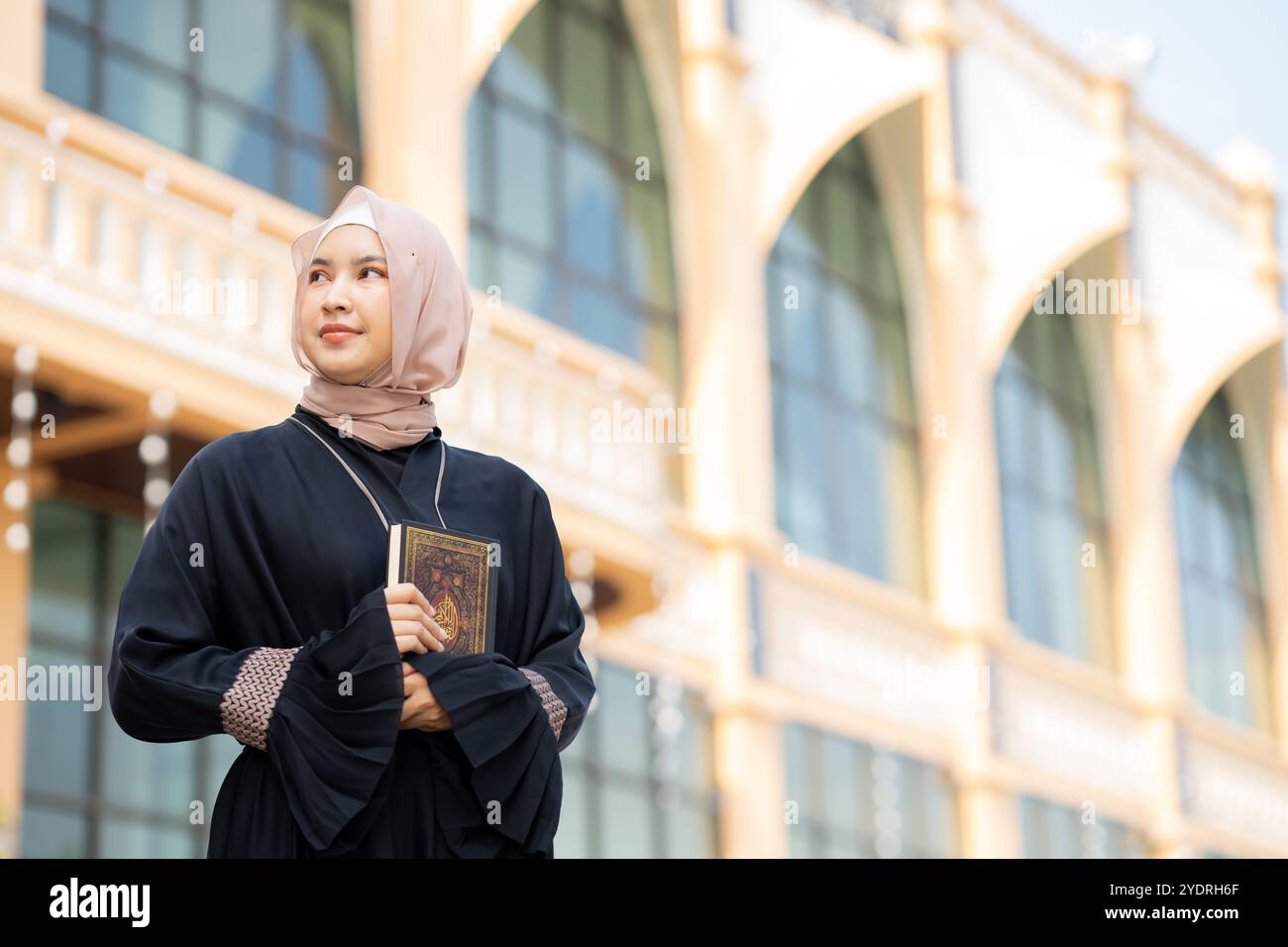 The image of an Asian Muslim woman in the Islamic religion in hijab in ...