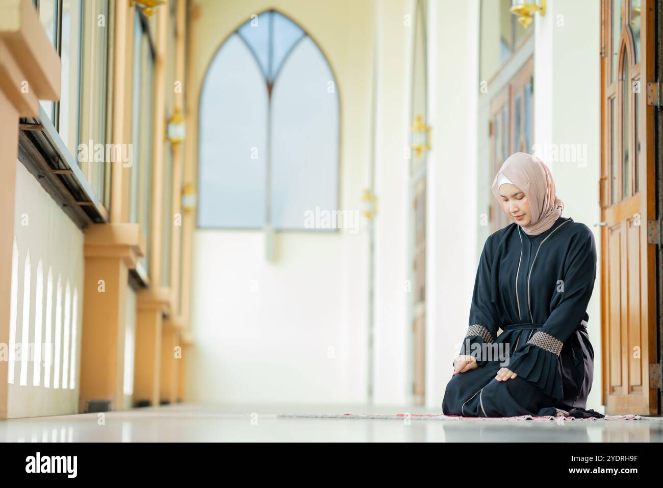 The image of an Asian Muslim woman in the Islamic religion in hijab in ...