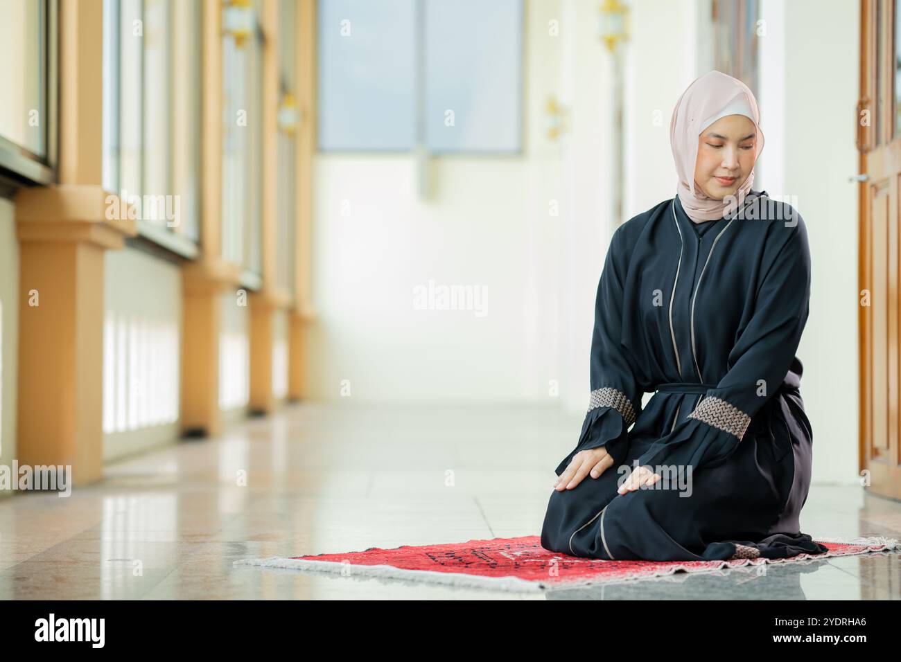 The image of an Asian Muslim woman in the Islamic religion in hijab in ...