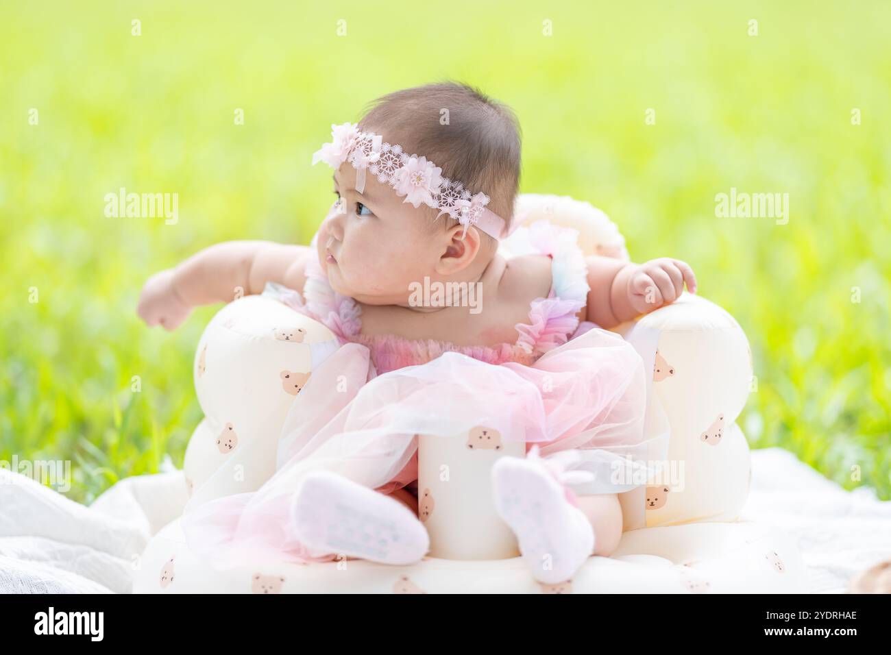 A Taiwanese couple in their 20s and their 7-month-old baby celebrate ...