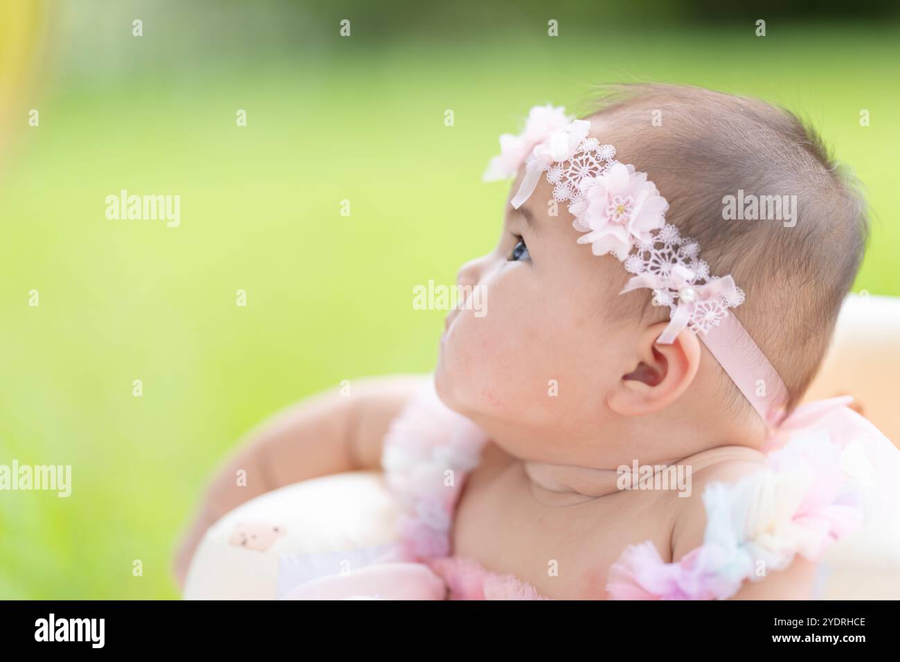 A Taiwanese couple in their 20s and their 7-month-old baby celebrate ...