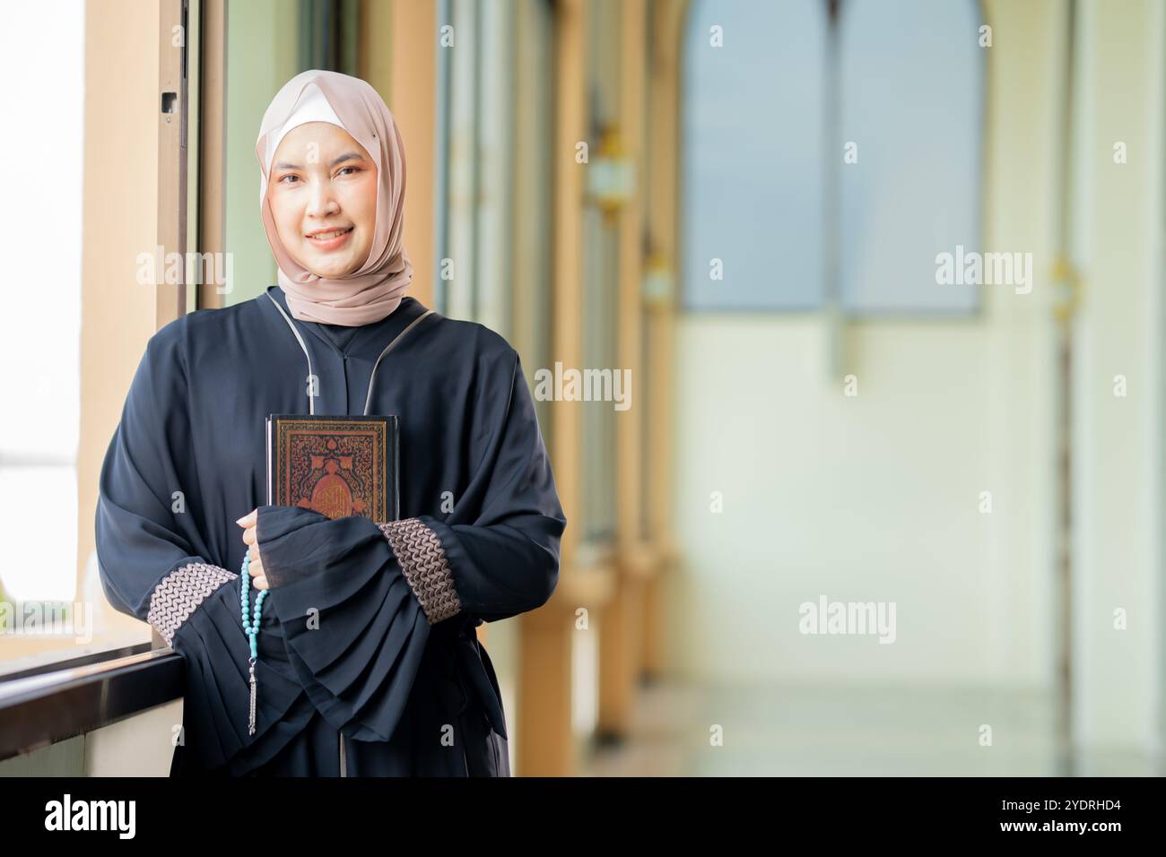 The image of an Asian Muslim woman in the Islamic religion in hijab in ...