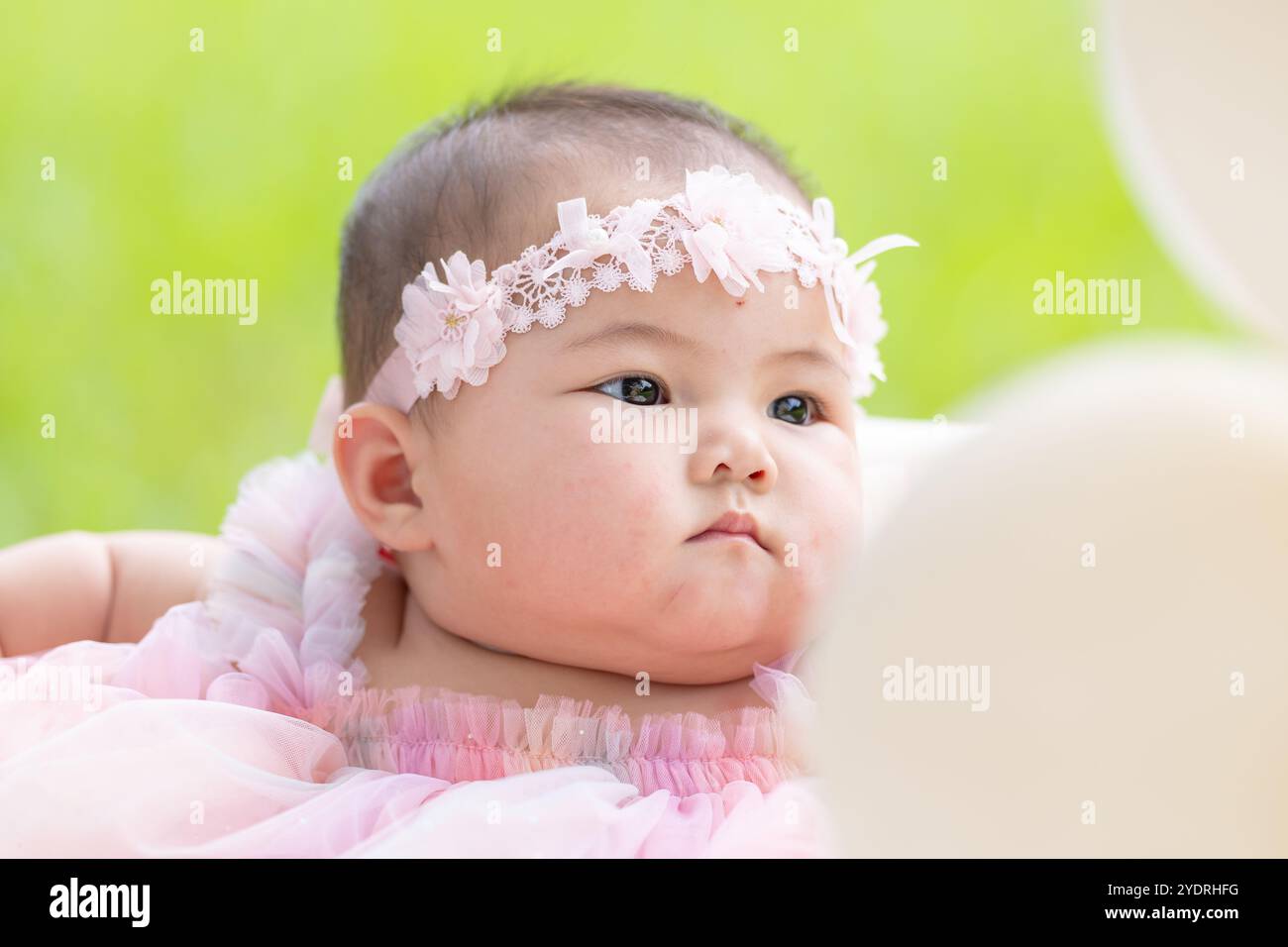 A Taiwanese couple in their 20s and their 7-month-old baby celebrate ...