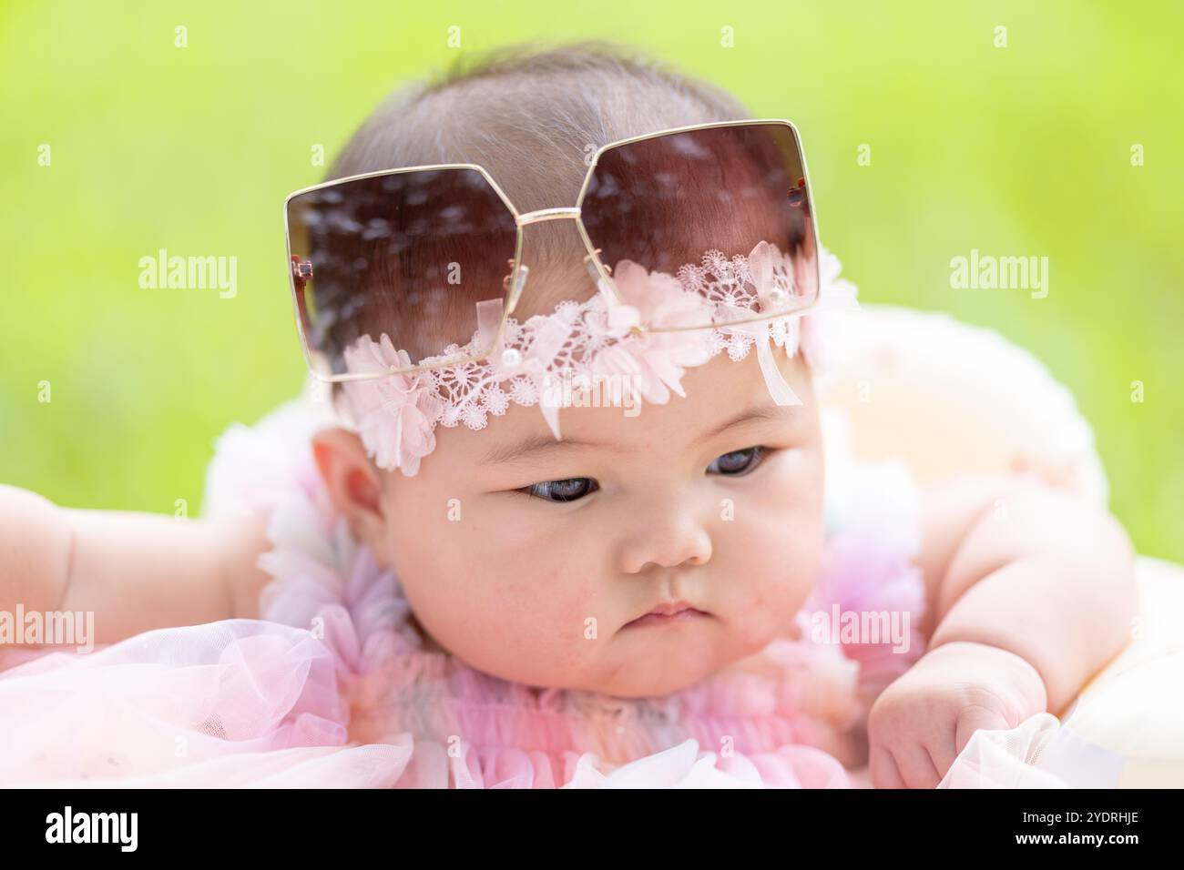 A Taiwanese couple in their 20s and their 7-month-old baby celebrate ...