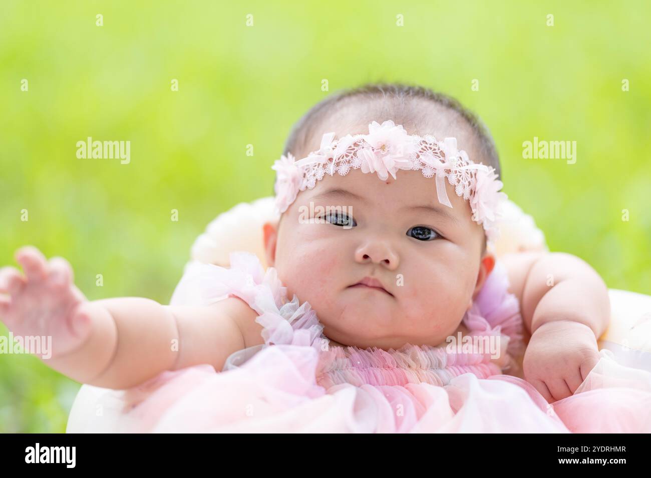 A Taiwanese couple in their 20s and their 7-month-old baby celebrate ...