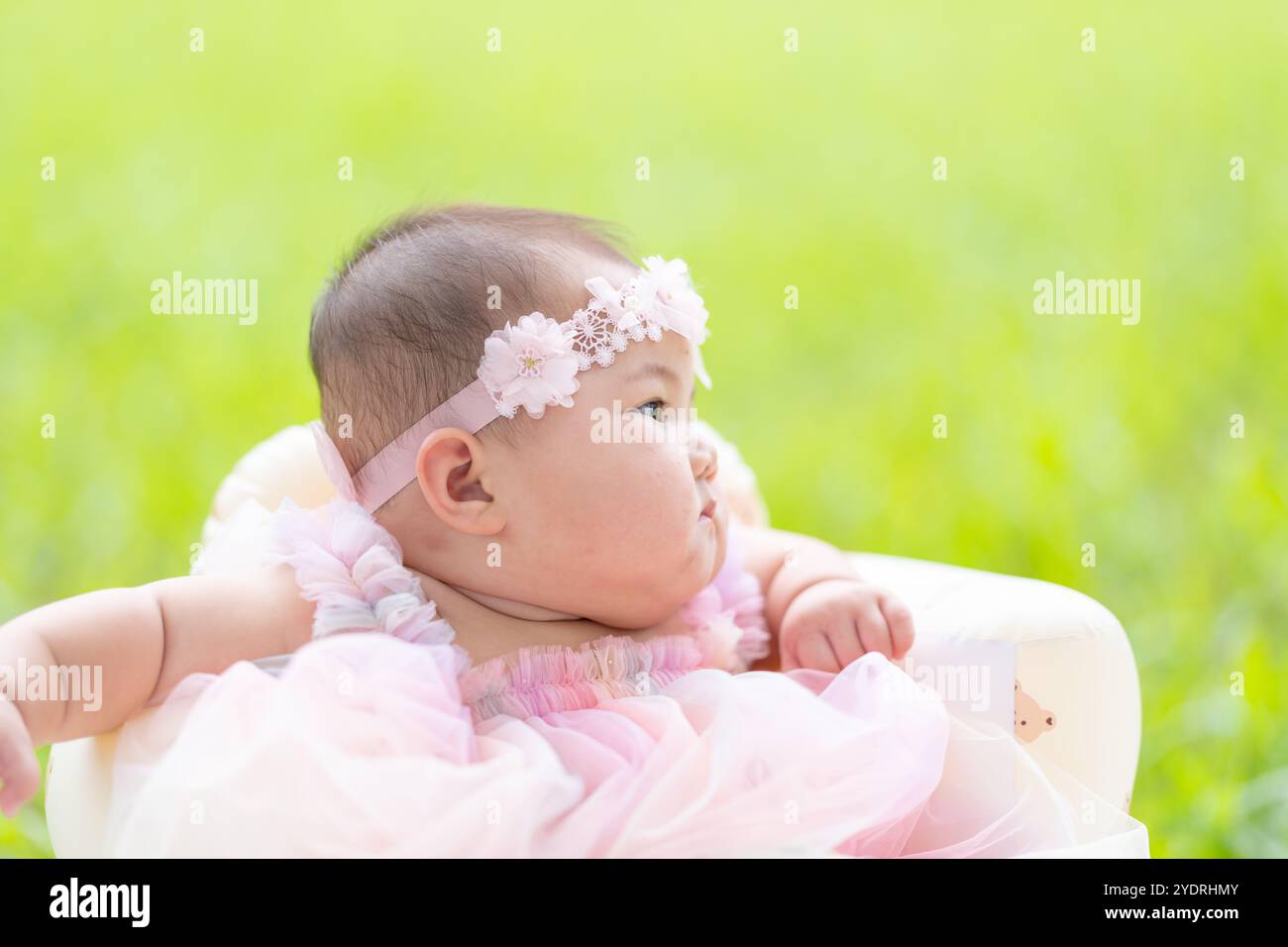 A Taiwanese couple in their 20s and their 7-month-old baby celebrate ...