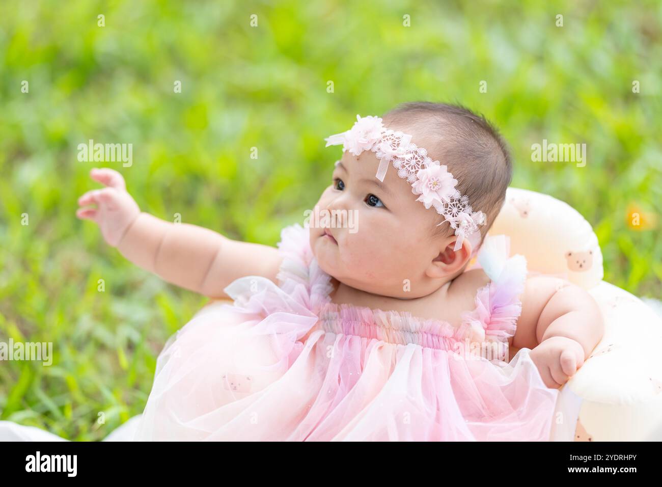 A Taiwanese couple in their 20s and their 7-month-old baby celebrate ...