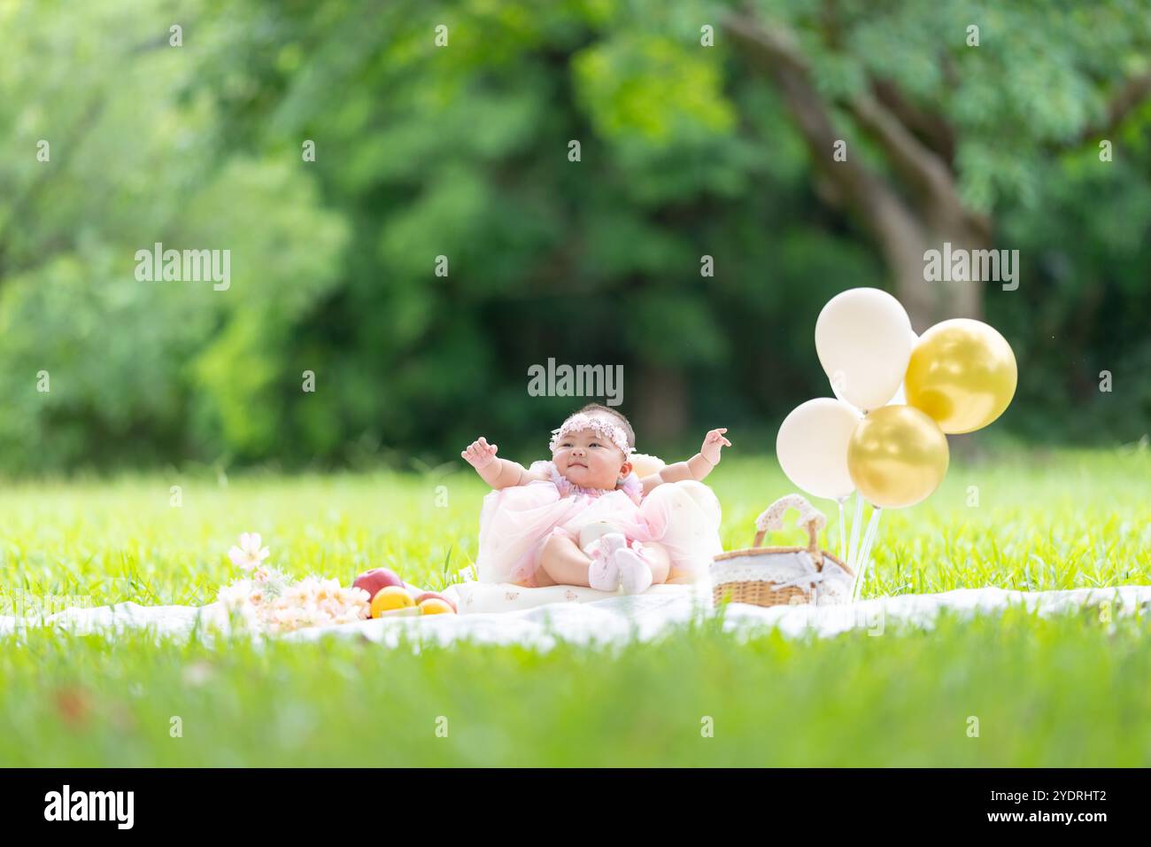 A Taiwanese couple in their 20s and their 7-month-old baby celebrate ...